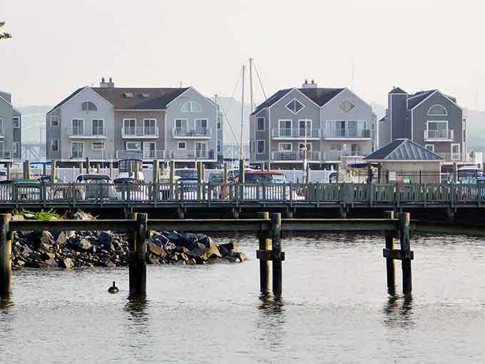 A quiet boardwalk pier, misty water, and historic homes reflected in the stillness — Havre de Grace in the off-season is a beautiful secret.