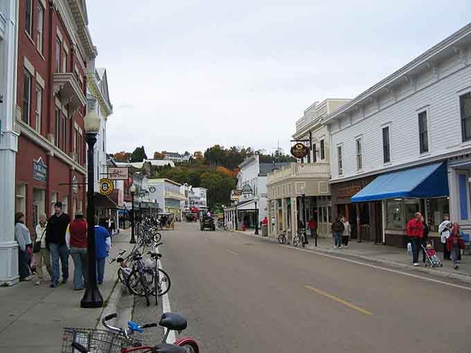 Bikes lined up, horse carriages rolling past, and not a car in sight: Mackinac Island's main street plays by its own wonderful rules.