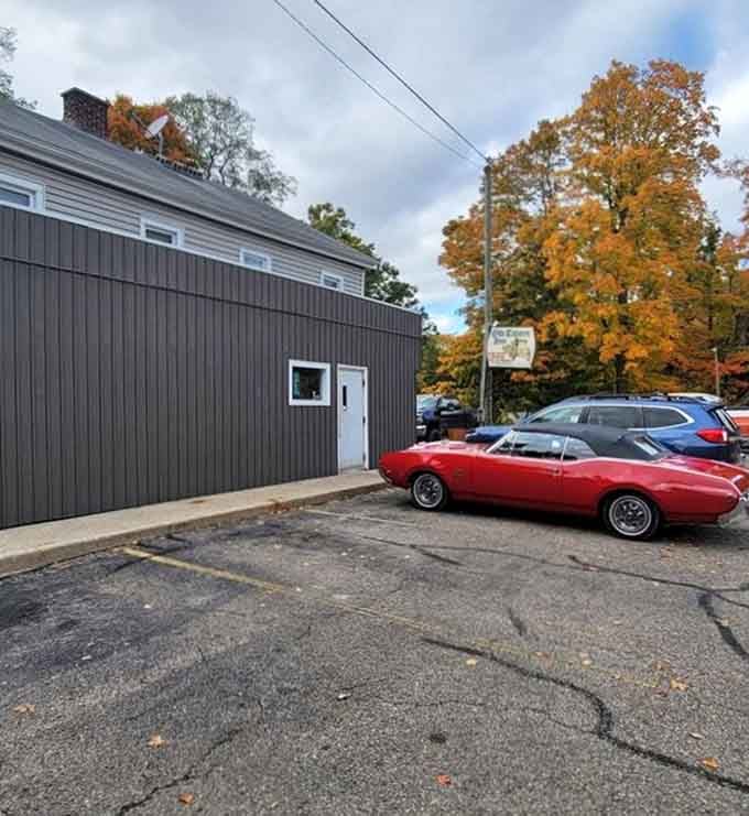 Autumn's fiery colors frame the Old Tavern Inn perfectly, with a classic red convertible stealing just a little thunder.