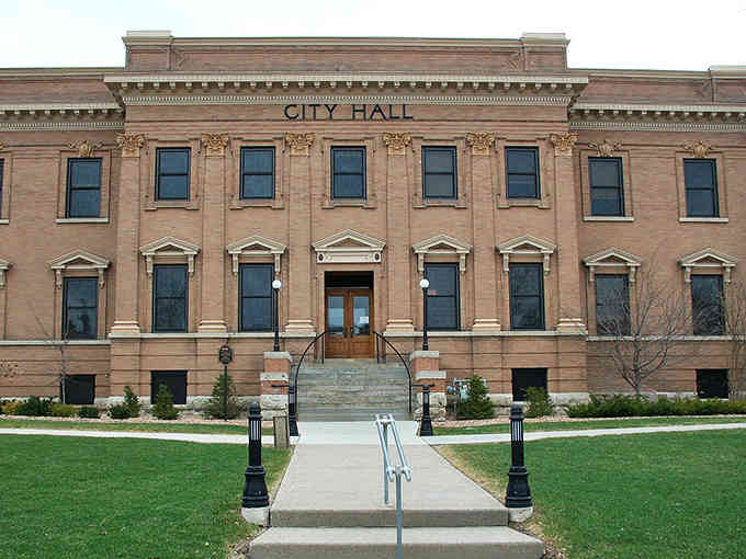 Historic charm awaits your discovery as you stroll past this grand City Hall, welcoming you with its classic brick facade.