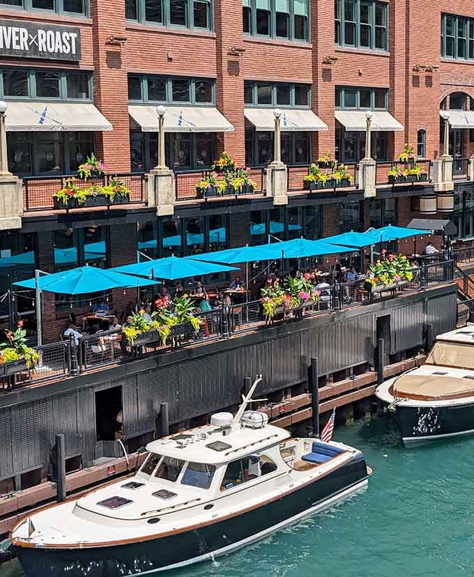 Bright blue umbrellas, flower boxes bursting with color, and boats gliding past &mdash; River Roast makes Chicago feel like a dream.