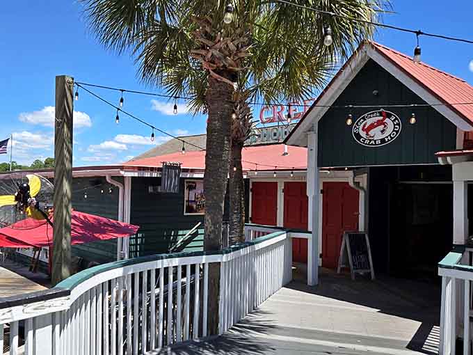 That sweeping boardwalk and red-roofed crab house logo tell you something wonderful is waiting just around the bend.