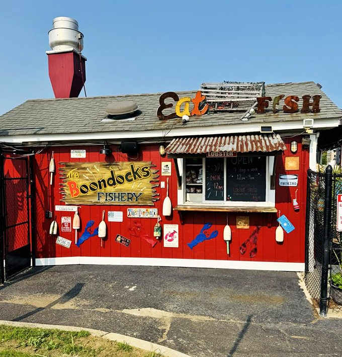 Bright red walls covered in license plates and lobster cutouts make this little shack look like it dressed itself with pure joy.