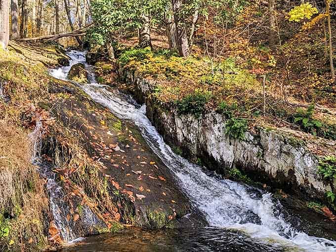 Water tumbles over ancient rocks in layers, like nature's own wedding cake made of stone and stream.