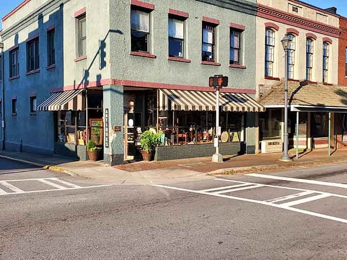 That striped awning on Washington's corner shop catches the morning light like it's been doing it for a hundred years and counting.