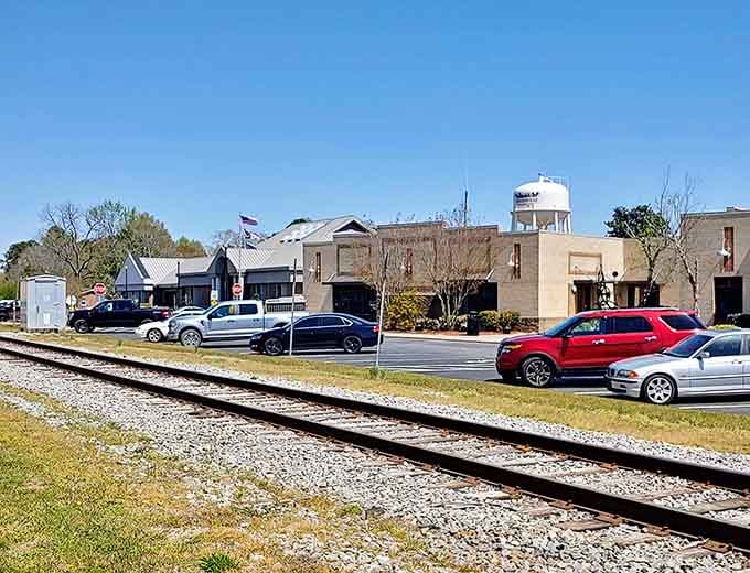 Railroad tracks, a proud water tower, and a crisp blue sky tell the quiet, unhurried story of Winterville perfectly.