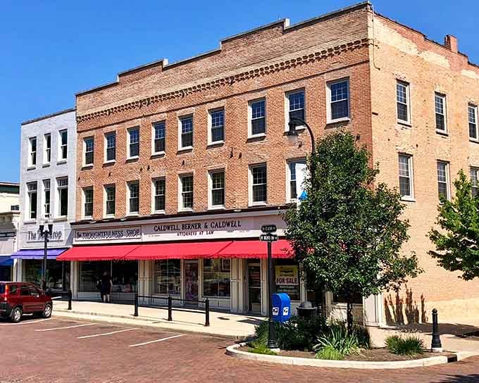 Princeton's sun-drenched corner block, with its red awning and tidy brick facade, radiates the kind of calm confidence small towns do best.
