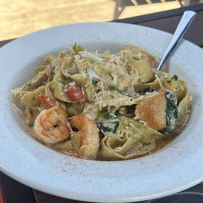 Shrimp and scallops tangling with pappardelle in Marsala cream sauce&mdash;this is pasta that means business and takes no prisoners.