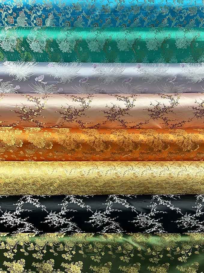 Silky, shimmering fabrics in jewel tones so rich they practically glow, perfect for that show-stopping project you've been planning.