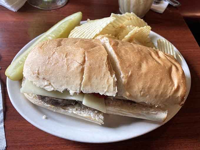 The Cudighi sandwich is pure Upper Peninsula comfort, nestled in bread with chips that actually look worth eating.