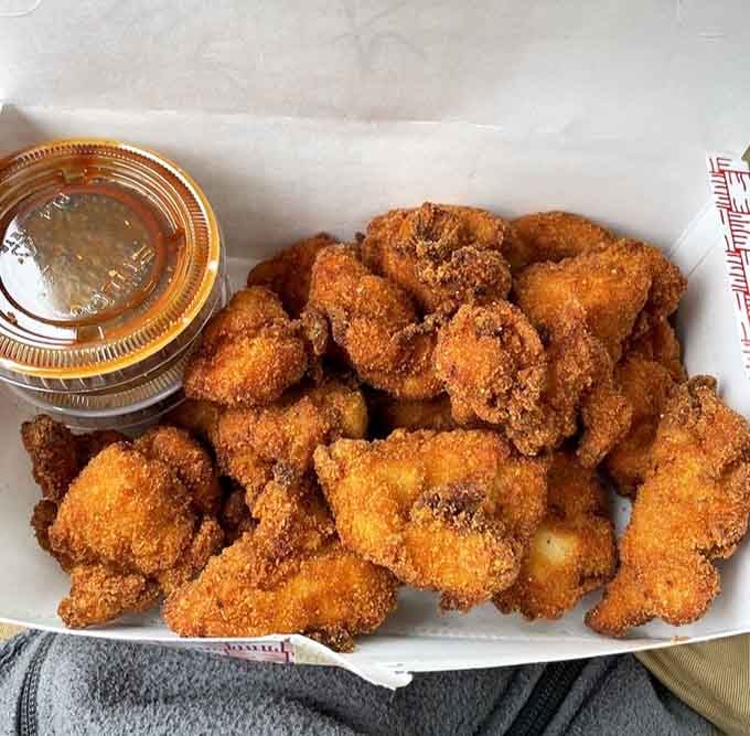 That crackling coating, that gorgeous color, that dipping sauce waiting patiently on the side. This is fried chicken done right.