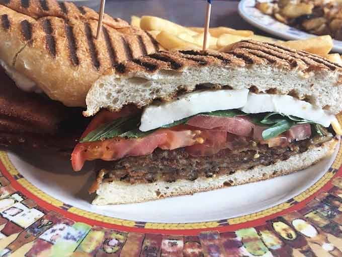 Grilled panini bread, fresh tomato, and melted mozzarella, proof that simple ingredients done right need no apology.