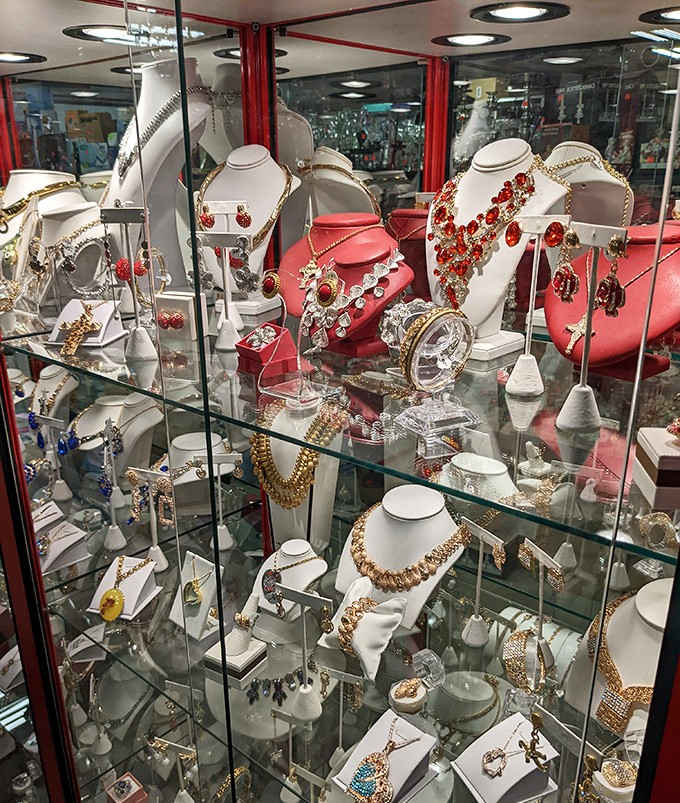 A glittering jewelry case packed with necklaces and earrings, because every treasure hunt deserves a grand finale.