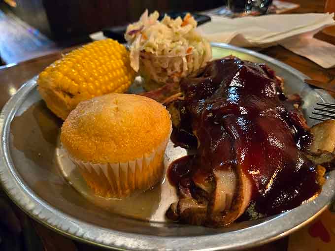 Brisket, cornbread, coleslaw, and corn on the cob on one plate. The frontier knew how to eat well.