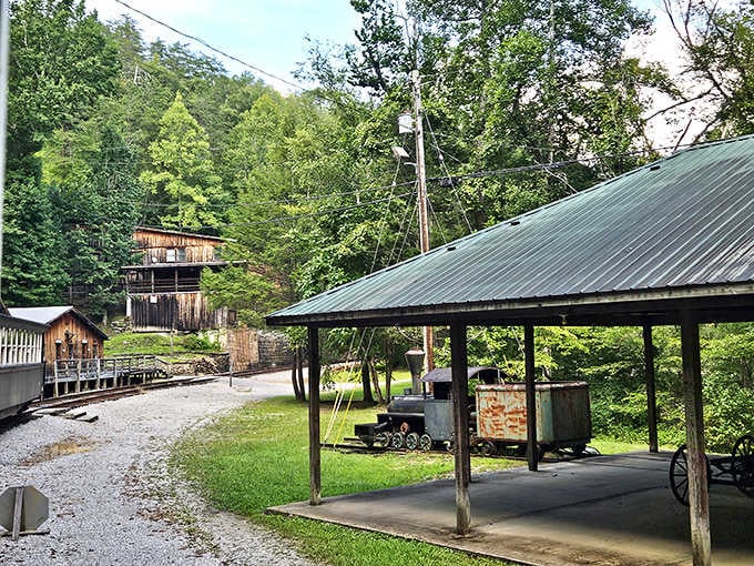 Barthell Coal Camp tells its story quietly, old structures and tall trees holding decades of Appalachian history between them.