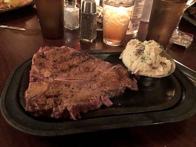 A porterhouse this size paired with mashed potatoes is the kind of plate that makes grown adults go quiet.