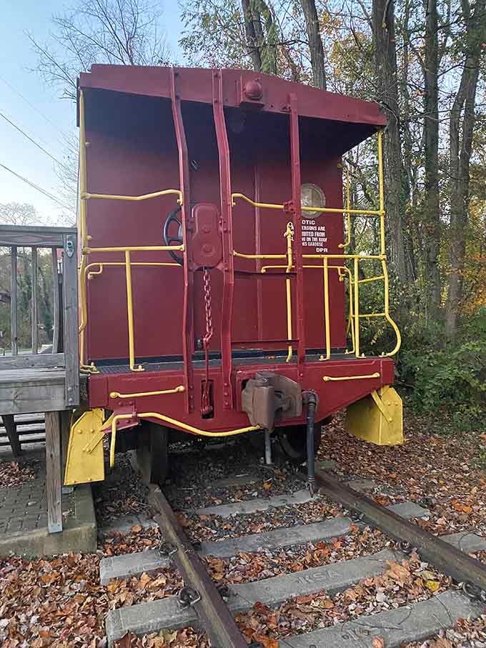 Bold red paint and bright yellow railings, this caboose has more personality than most people you'll meet.