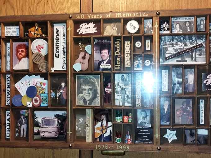 Two decades of memories plastered on wood, each photograph and trinket telling stories from better times.