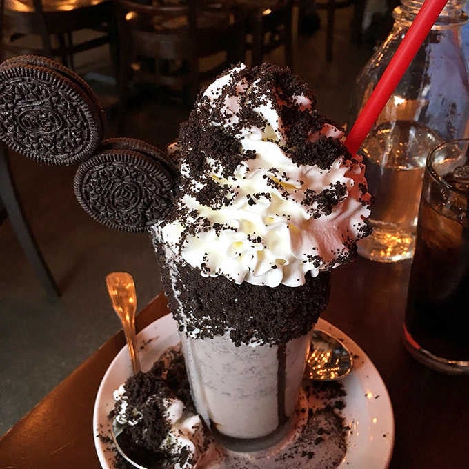 The Oreo frappe arrived looking like a dessert that graduated top of its class with honors.