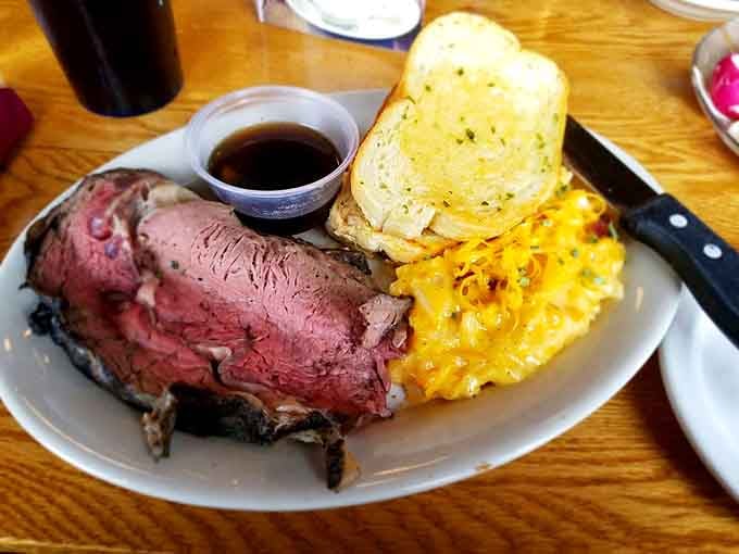 Prime rib so pink and tender it arrives looking like it won a beauty contest. The au jus agrees.