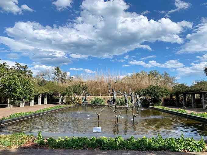 The Fountain of the Muses surrounded by dancing water jets proves that art and nature make excellent roommates.