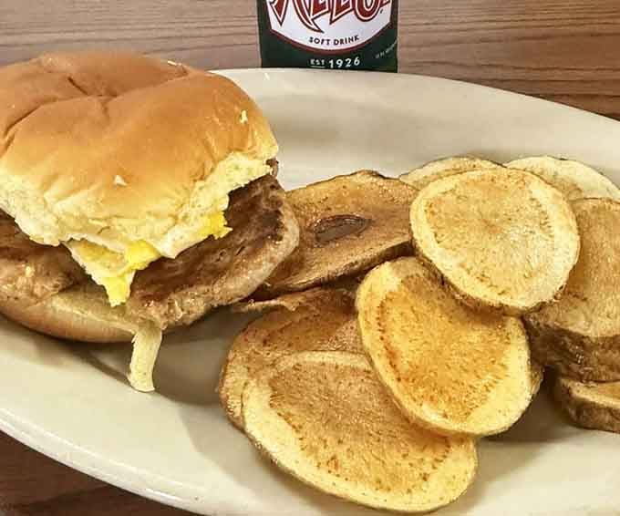 Crispy homemade chips, a soft bun, and a hearty filling with a Ale-8 standing guard in the background &mdash; Kentucky on a plate.
