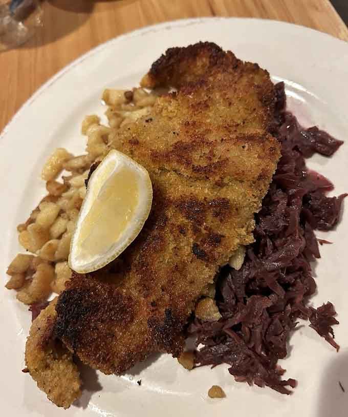 That golden crust, that perfect lemon wedge — this breaded cutlet looks like it arrived straight from a Viennese grandmother's kitchen.