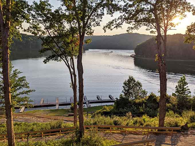 Golden hour transforms the lake into liquid amber, with a dock beckoning you toward tranquil evening contemplation.