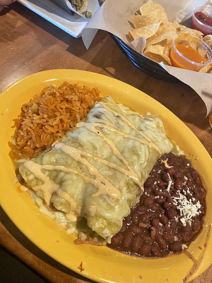 Draped in green chile sauce and chipotle cream, these chicken enchiladas are the definition of comfort with ambition.