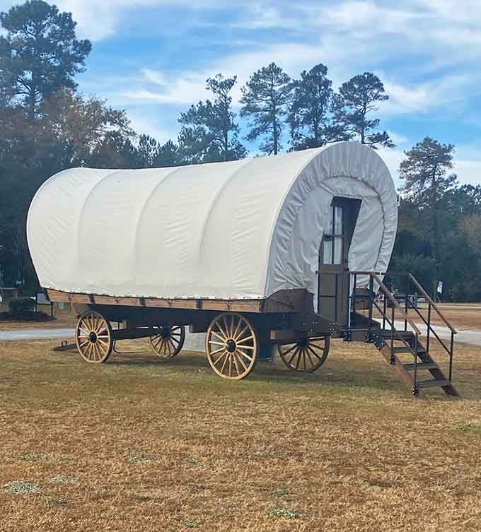 From this angle, the Conestoga Wagon looks ready to roll west. Spoiler: it stays put for you.