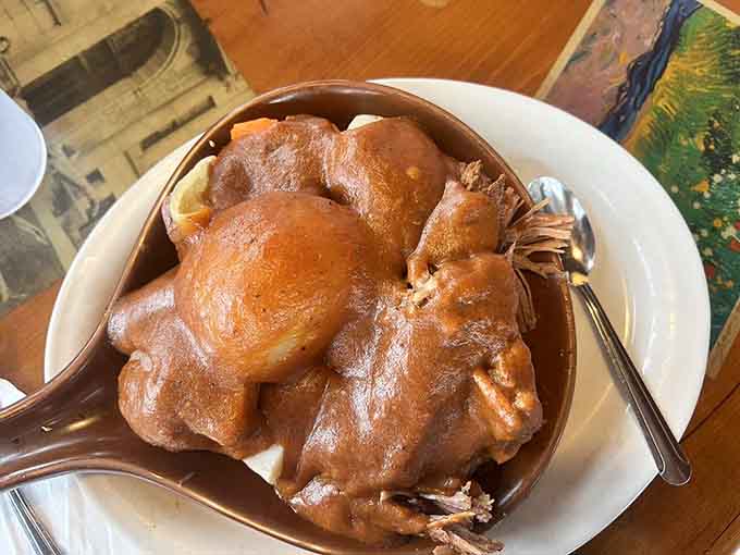 Slow-cooked pot roast so tender it practically surrenders to the spoon before you even try.