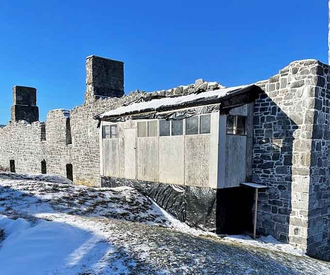 Even in winter, these stubborn stone walls stand their ground, dusted with snow and absolutely unbothered by the cold.