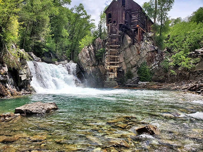 Spring runoff turns the Crystal River into a torrent that makes the mill's location seem even more improbable.