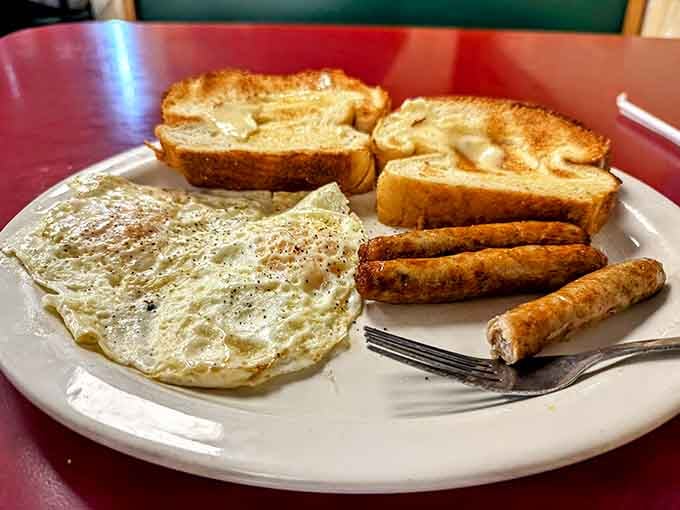 Eggs, sausage links, and buttery toast. Simple, golden, and absolutely impossible to argue with.