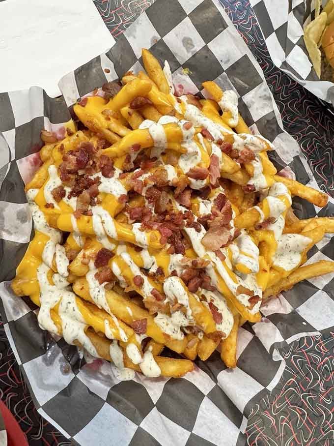 Loaded fries with cheese, bacon, and ranch dressing, because sometimes a side dish refuses to play second fiddle.