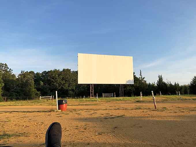 That big white screen just sitting there in the golden hour light, patient and ready for showtime.