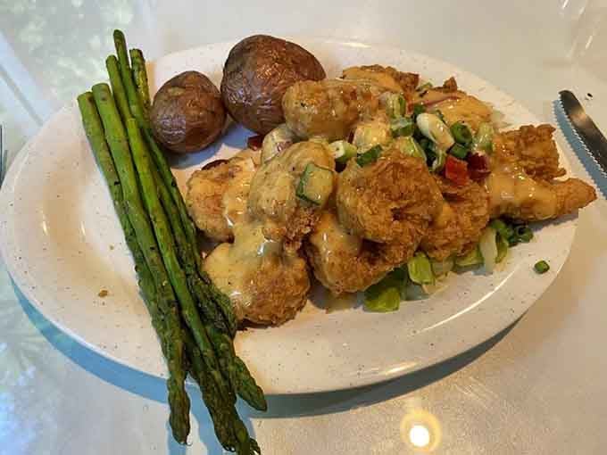 Golden, crispy, and sauced to perfection. This Firecracker Shrimp platter means business from the very first bite.