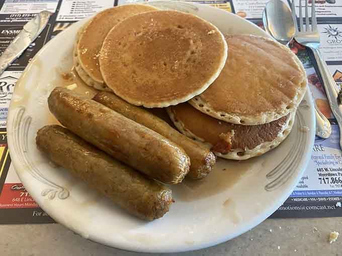 Fluffy pancakes and sausage links that smell like a Saturday morning should always smell. Pure, uncomplicated joy on a plate.