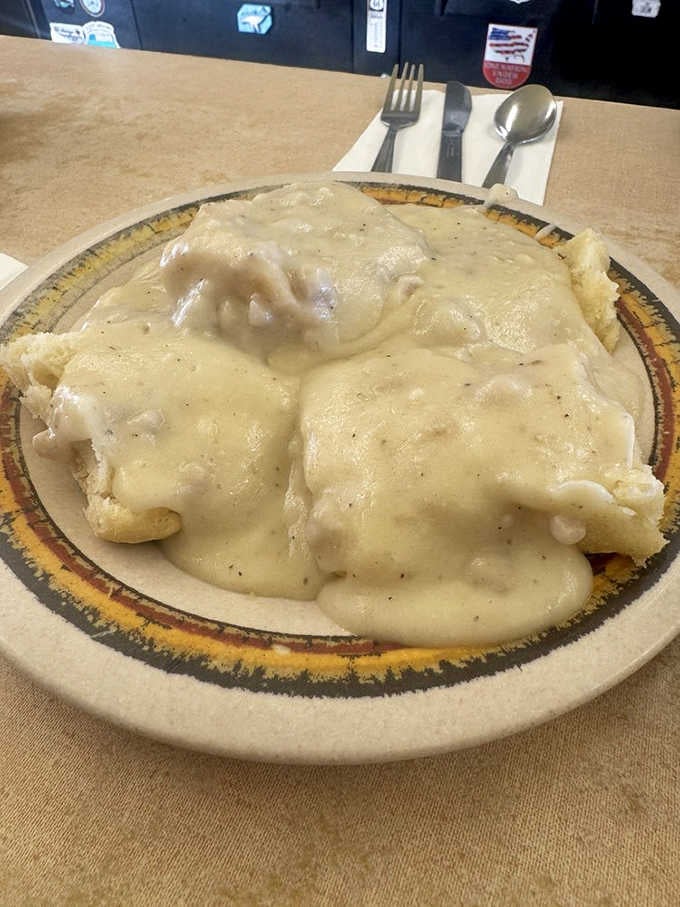 Biscuits and gravy done right, thick, creamy, and generous enough to make you reconsider your whole morning.