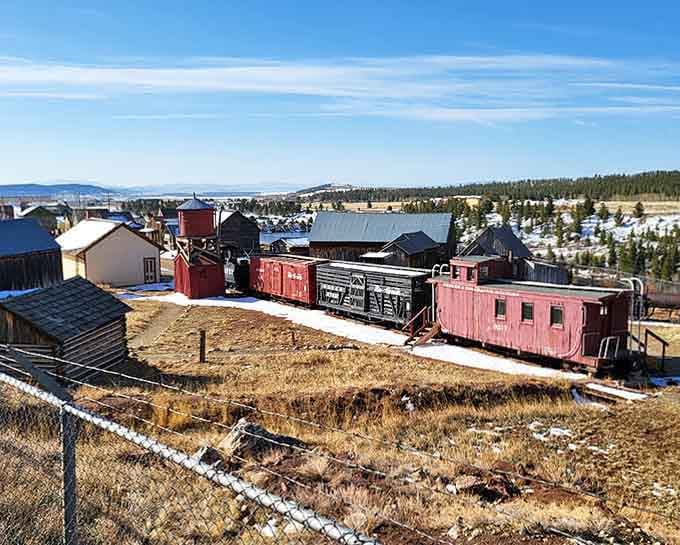 Vintage train cars rest on the hillside, retired from hauling ore but still telling stories to anyone who'll listen.