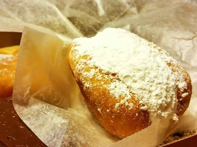 Dusted in powdered sugar and absolutely unapologetic about it. This beignet means serious business.