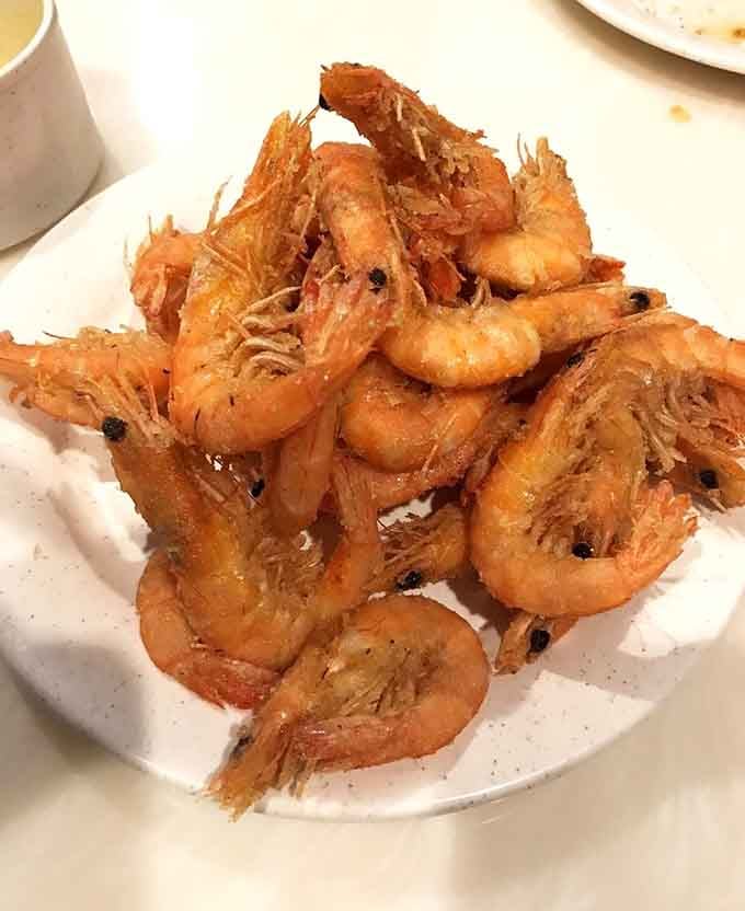 Crispy, golden, and piled high, these fried shrimp are the definition of beautiful chaos.