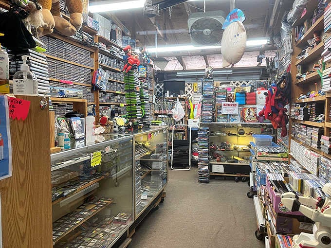 Shelves packed with video games, DVDs, and collectibles. Your inner kid just found its happy place.