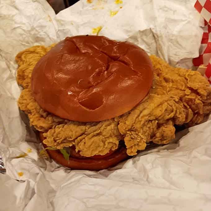 This chicken sandwich could probably bench press more than you, and it's definitely winning the size competition.