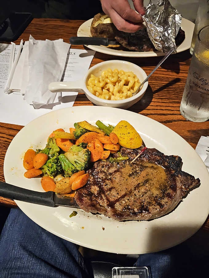 A ribeye this beautiful, served with roasted vegetables and mac and cheese on the side, is a full life decision.