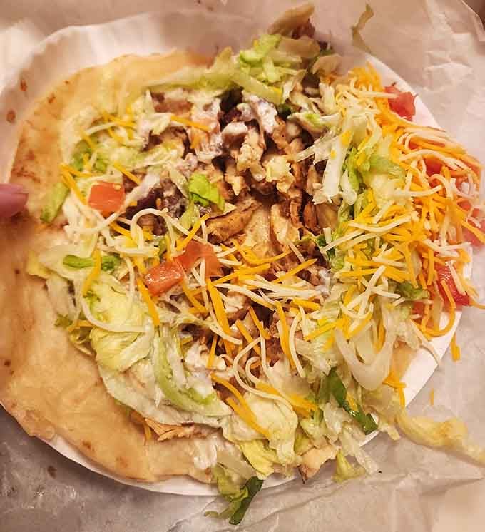 That chicken taco is practically overflowing with goodness, proving that sometimes more really is more when it comes to fillings.