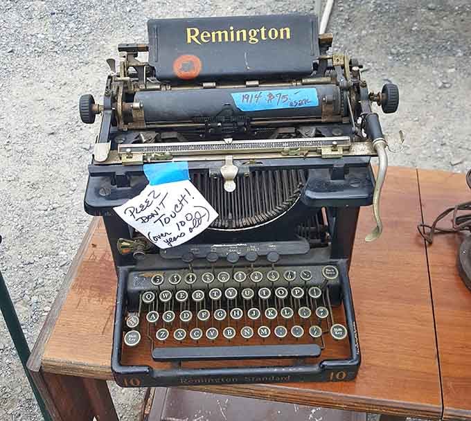 A Remington typewriter from 1914 with a handwritten "Please Don't Touch" note. Some treasures demand a little respect.