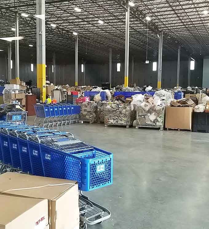 Behind the scenes, the blue carts and push bins are already loaded and ready for action.