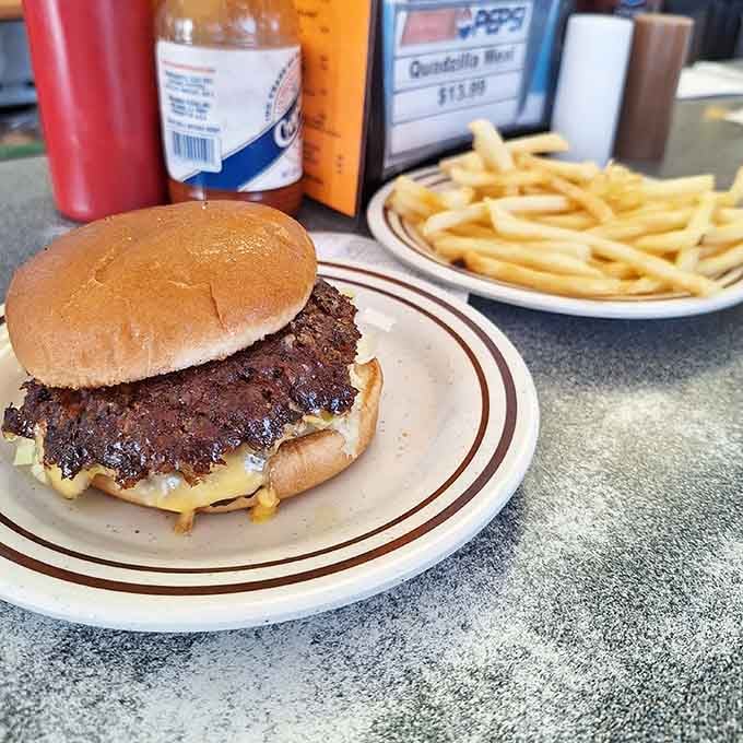Two patties stacked with purpose. Gordon's double cheeseburger is the kind of burger that makes you put your phone down.