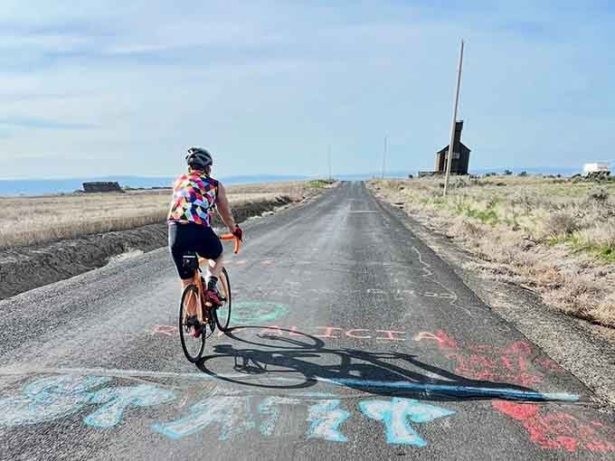 Even cyclists can't resist Gravity Hill. Pedaling uphill has never felt quite this delightfully confusing.